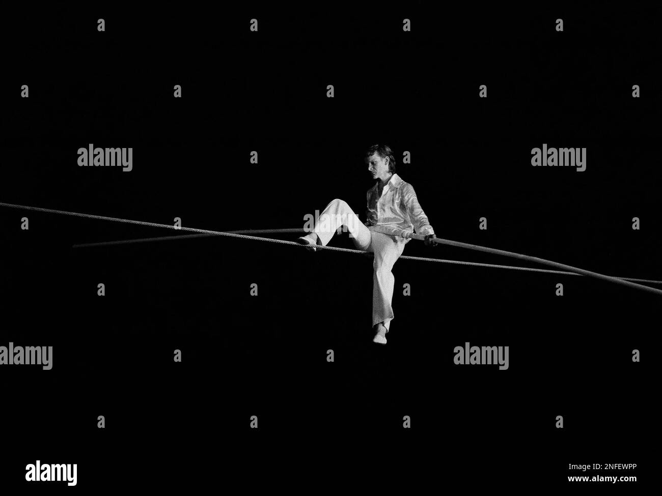 French tightrope walker Philippe Petit has a seat during his ...