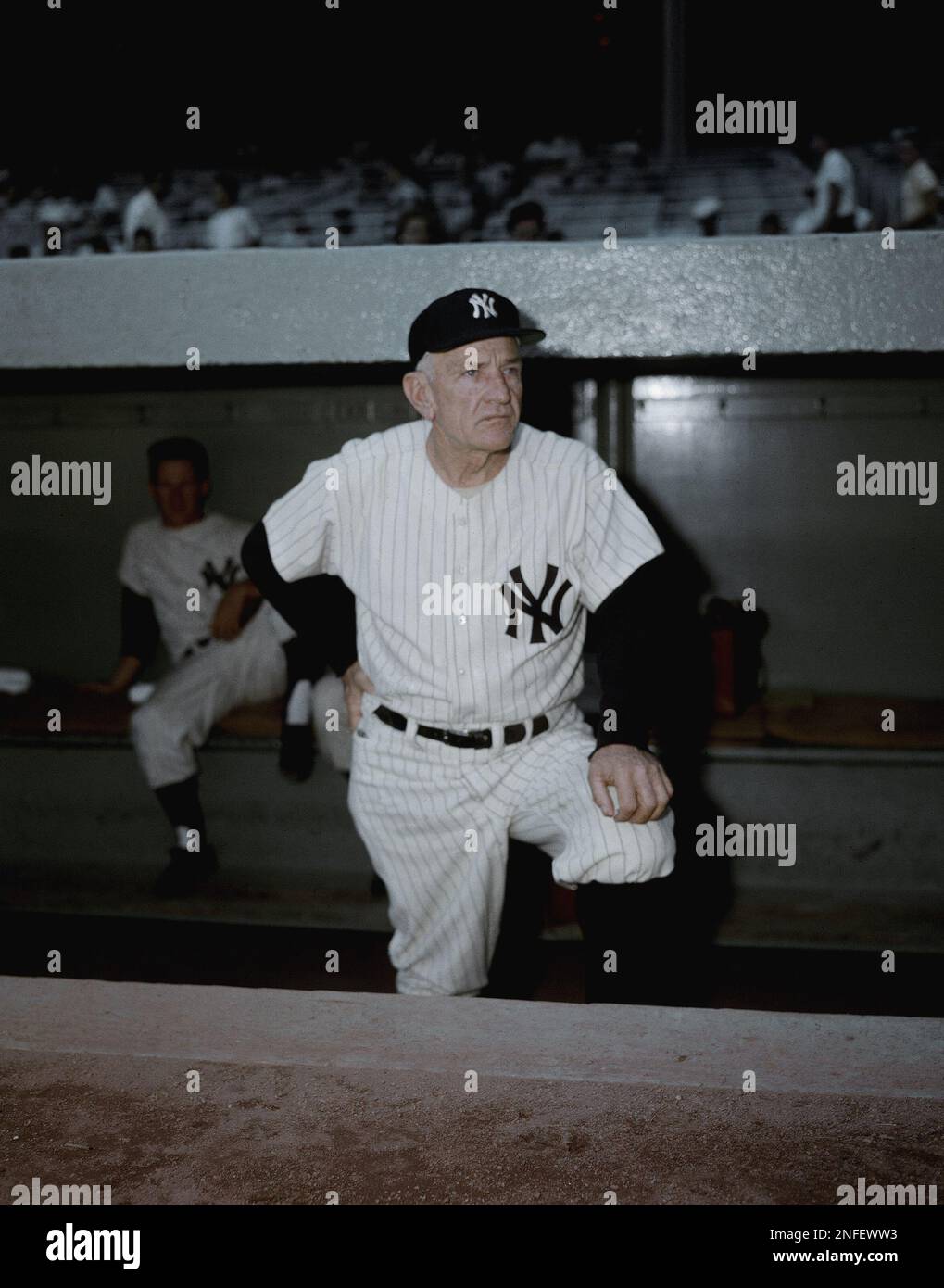 New York Yankees manager Casey Stengel poses in the dugout, Sept. 5 ...