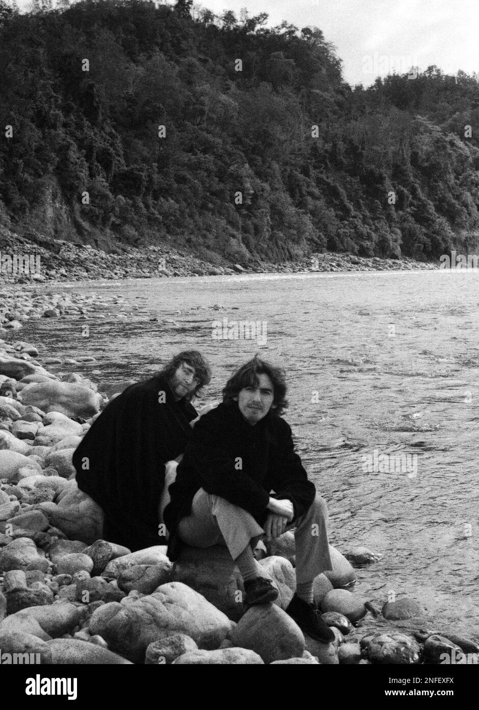 Two of Britain's pop group 'The Beatles', George Harrison, right, and ...