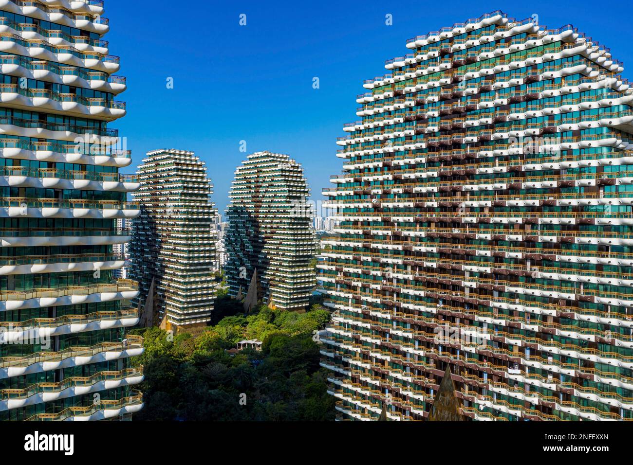 A view of tree-shaped hotel buildings in Sanya city in south China's ...