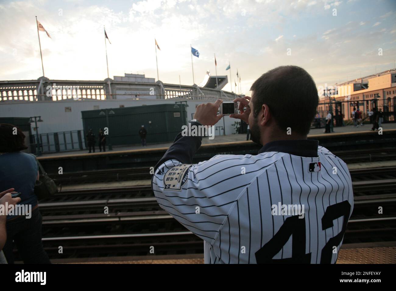 Fans arriving by subway at the 161st Street station take photos of ...