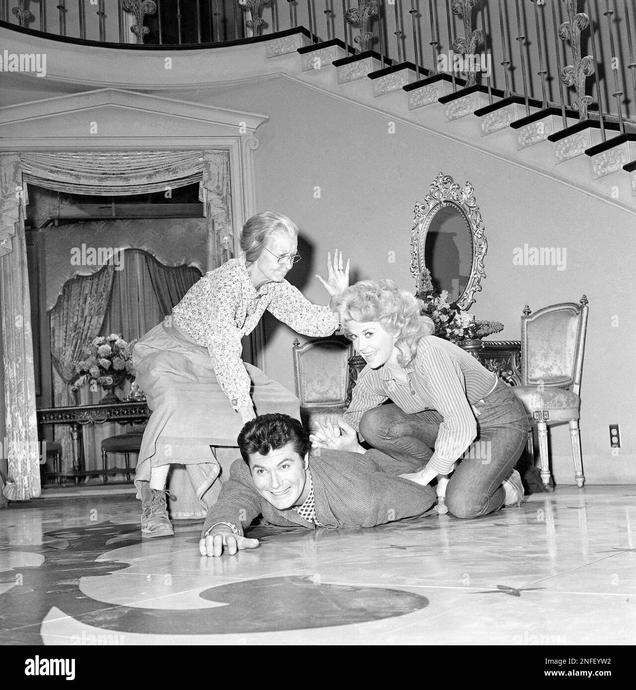 From left to right, actors Irene Ryan as Granny, Max Baer, Jr. as Jethro, and Donna Douglas as ...