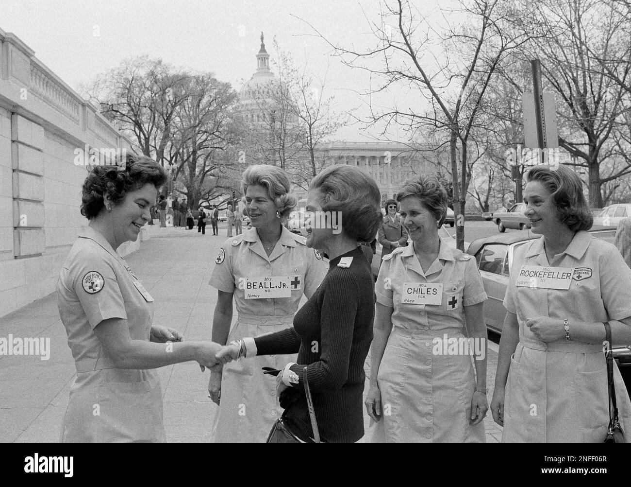 Mrs. Betty Ford is greeted by members of the Ladies of the Senate as ...