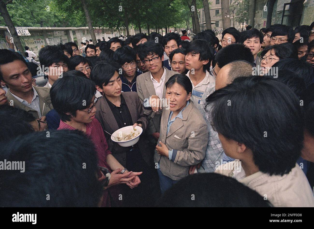 A co-ed discussing China's student movement with Beijing University ...