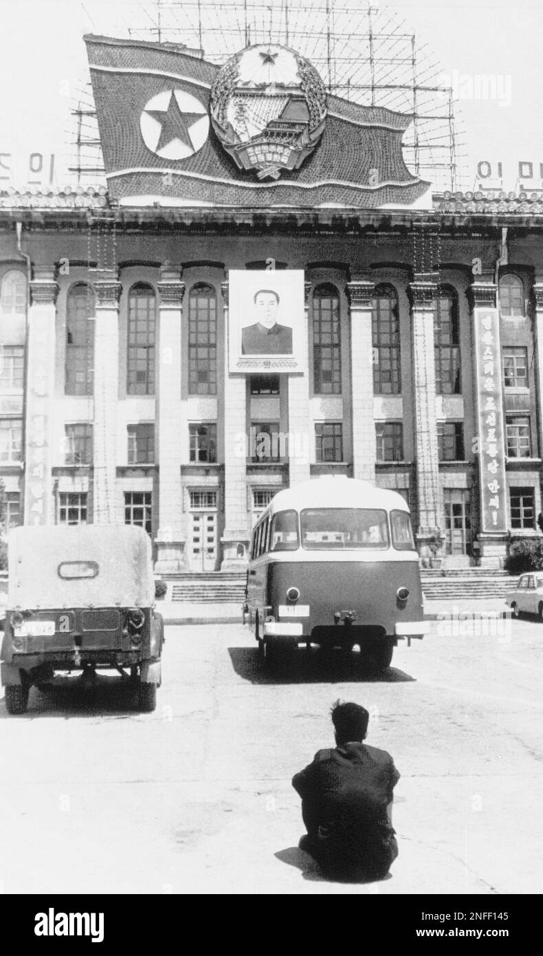 A bus driver rests in Kim Il-Sung Square in the center of Pyongyang in ...