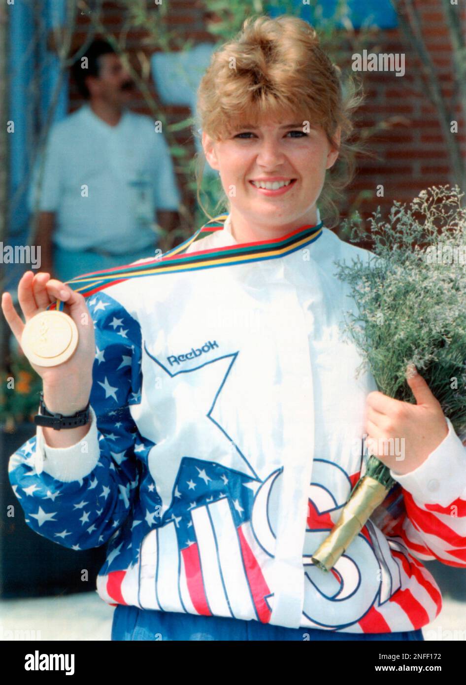 American shooter Launi Meili holds up her Olympic gold medal at Mollet ...