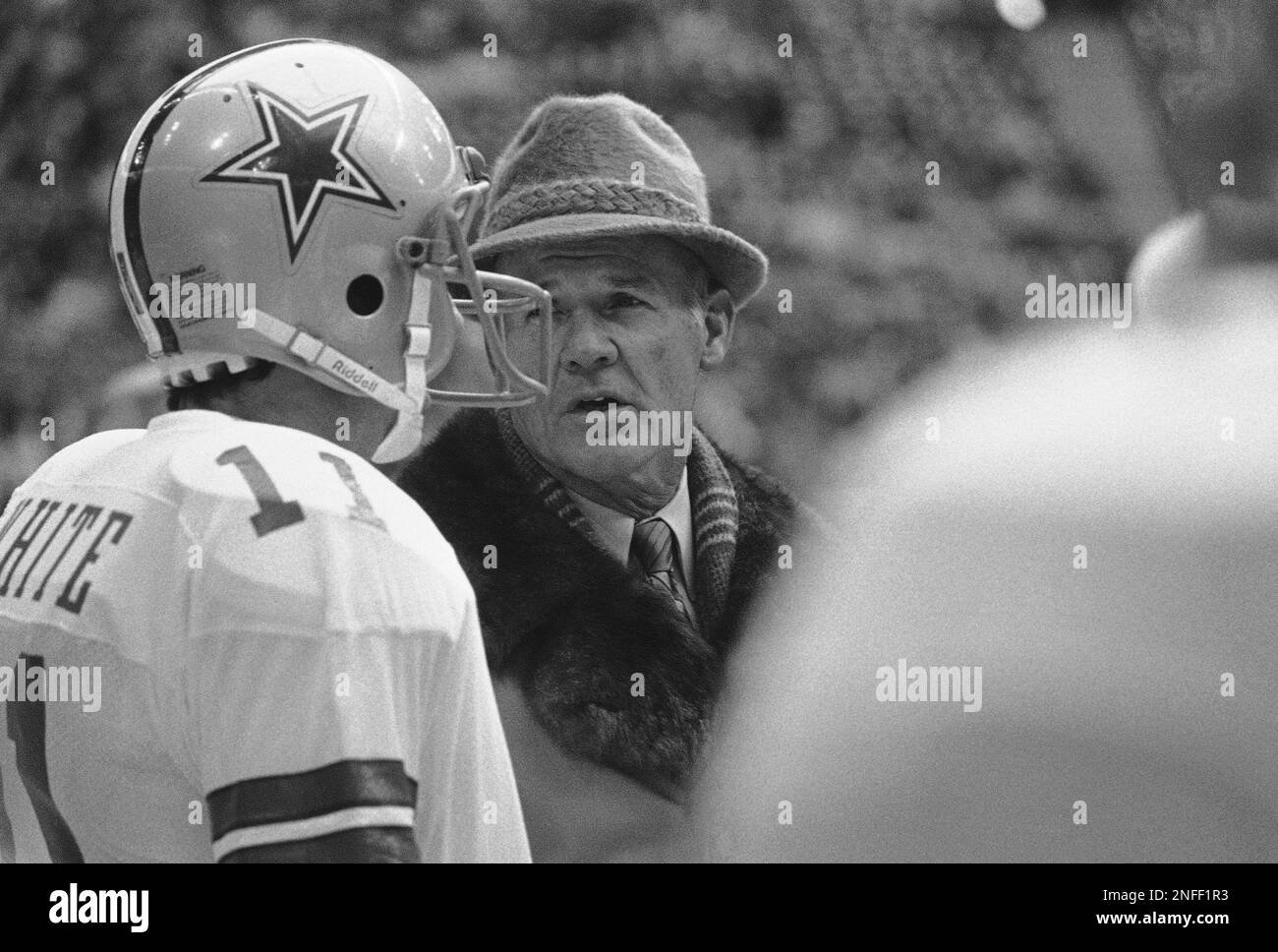 Dallas Cowboy's coach Tom Landry talks with quarterback Danny White on ...