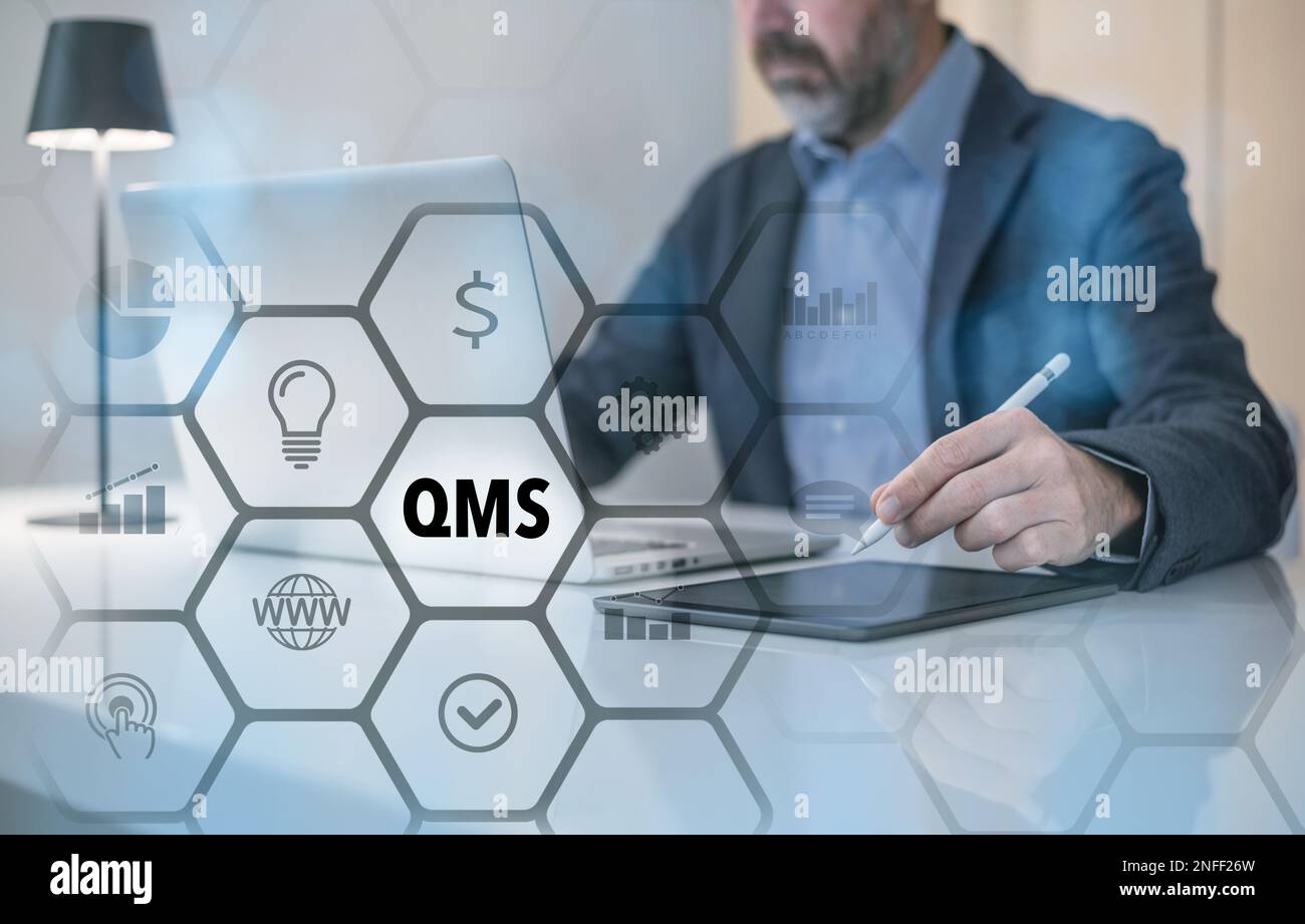 Quality management system concept. Businessman touching virtual ...