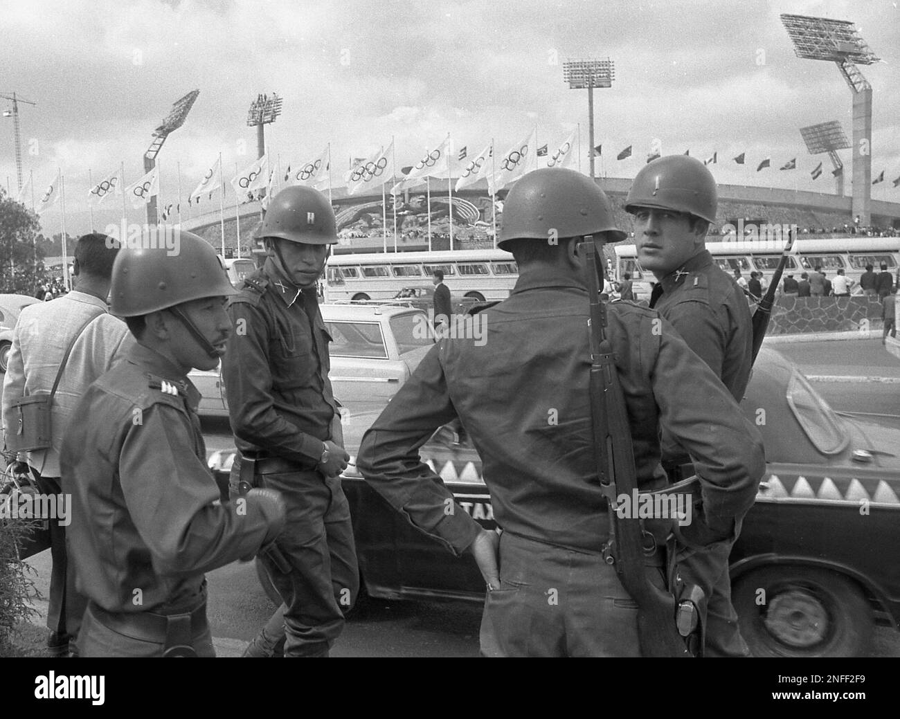 Mexican soldiers stand guard at strategic positions around the ...