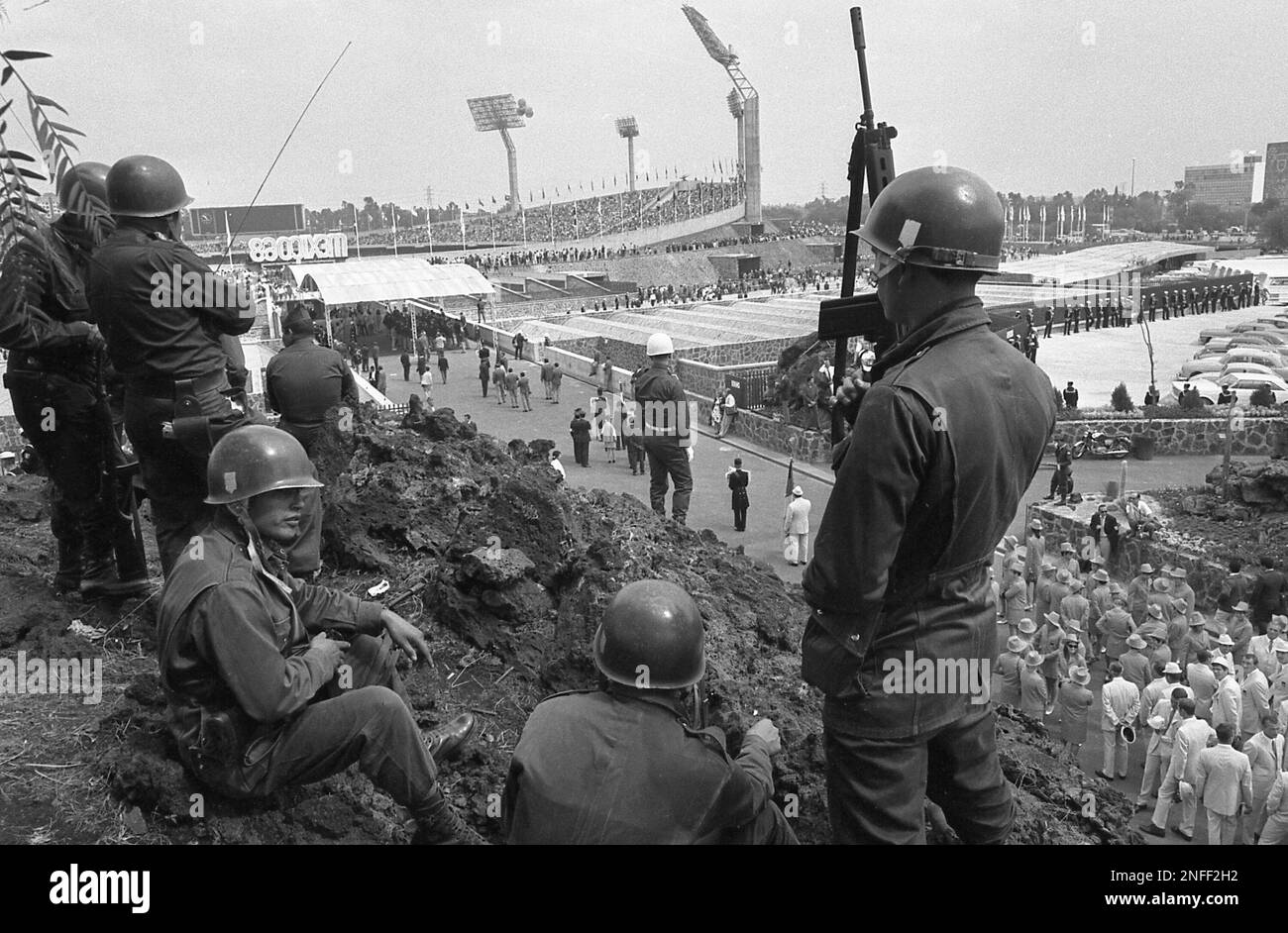 Mexican soldiers stand guard at strategic positions around the ...