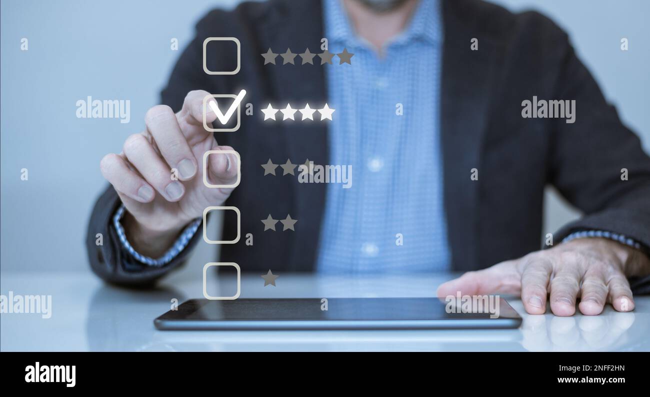 Customer review satisfaction feedback survey. User giving rating to ...