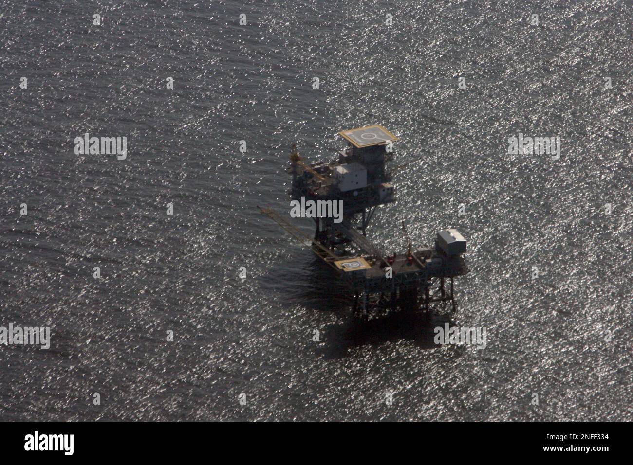 An oil rig platforms is photographed in the Gulf of Mexico near New ...