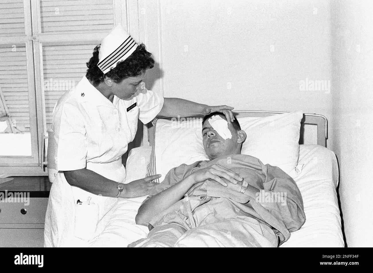Miss Anna Richman, chief of nurses at American Hospital fixes eye of ...