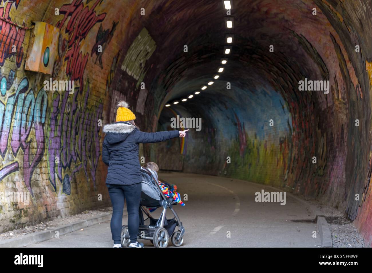 Woman with child in pushchair, Colinton railway tunnel, painted by ...