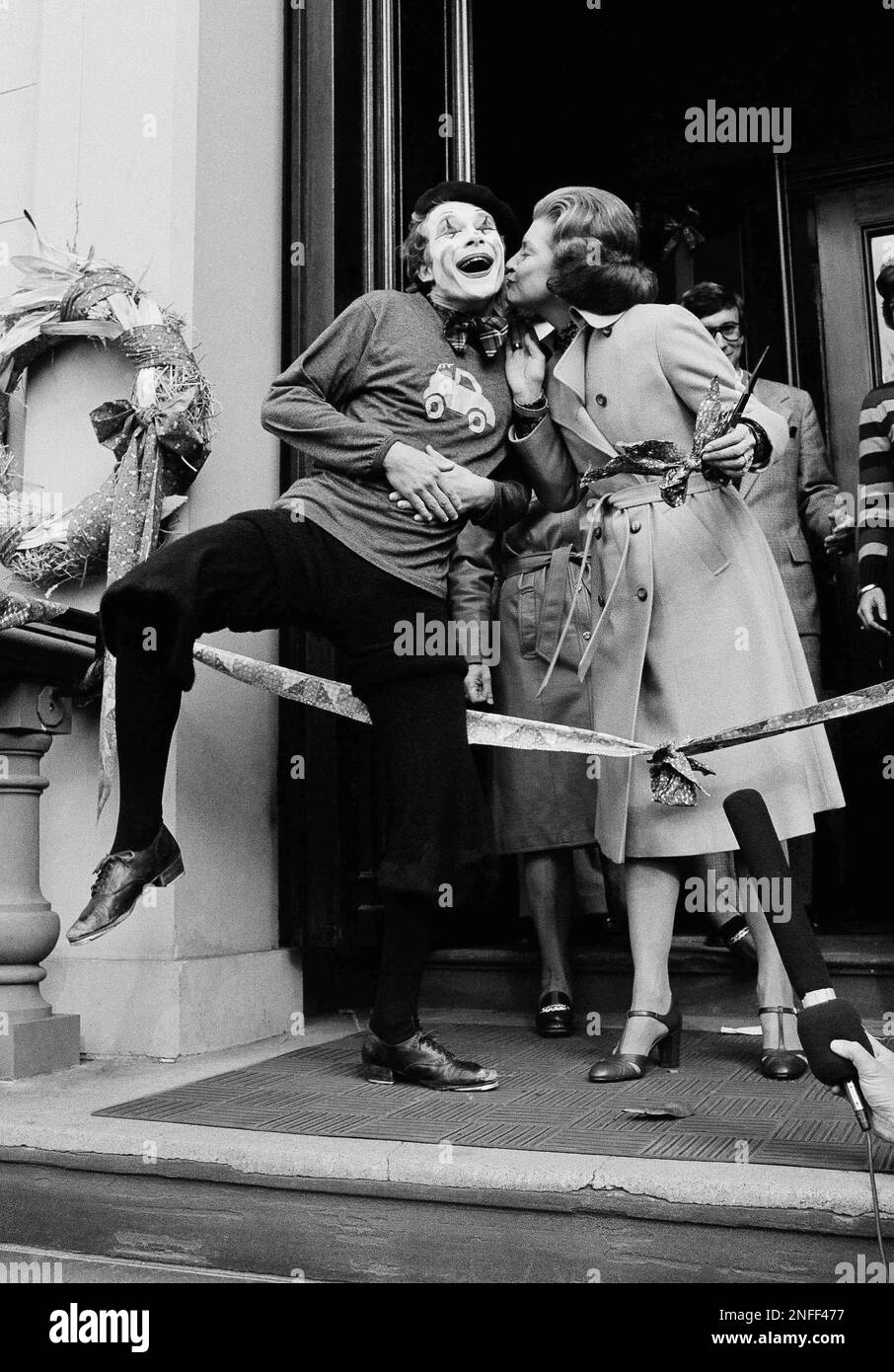 First lady Betty Ford plants a kiss on the cheek of Joe Jeff Goldblatt ...
