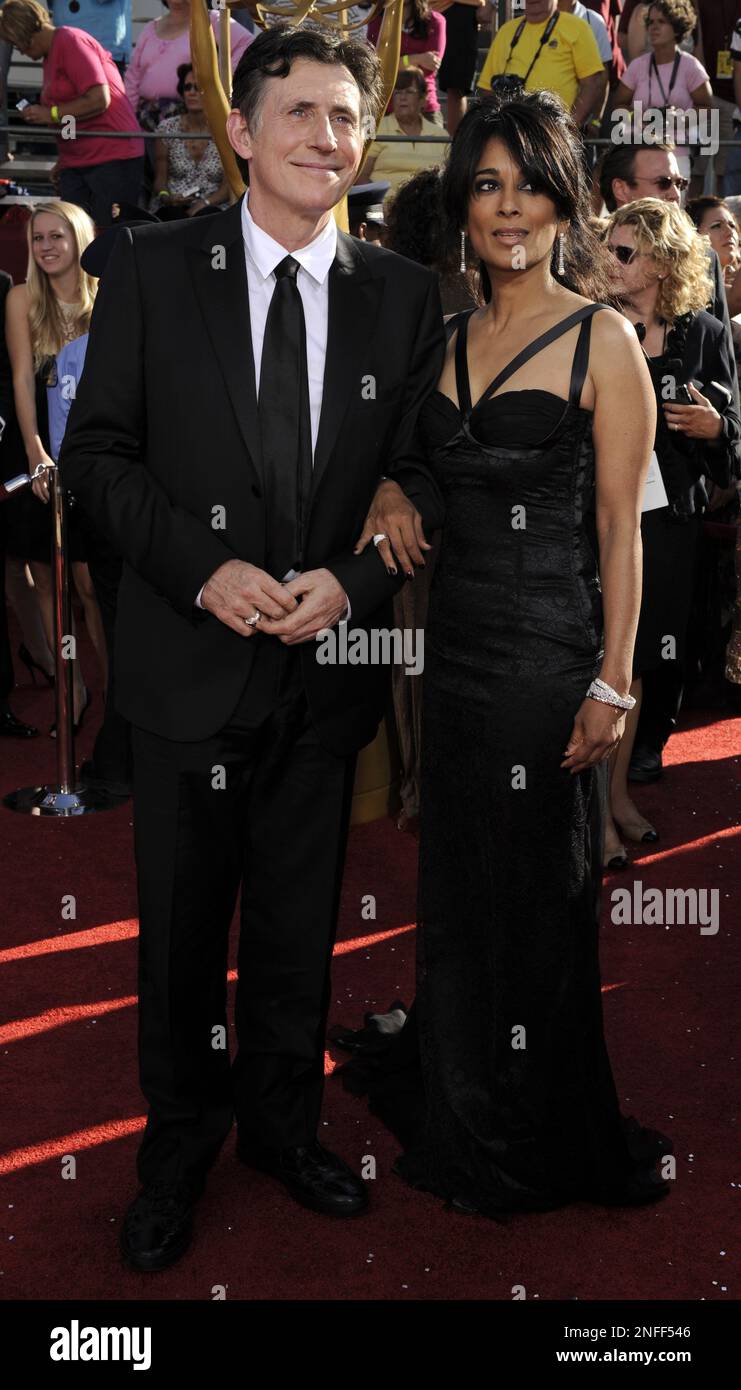 Gabriel Byrne, left, and Anna George arrive at the 60th Primetime Emmy Awards in Los Angeles ...