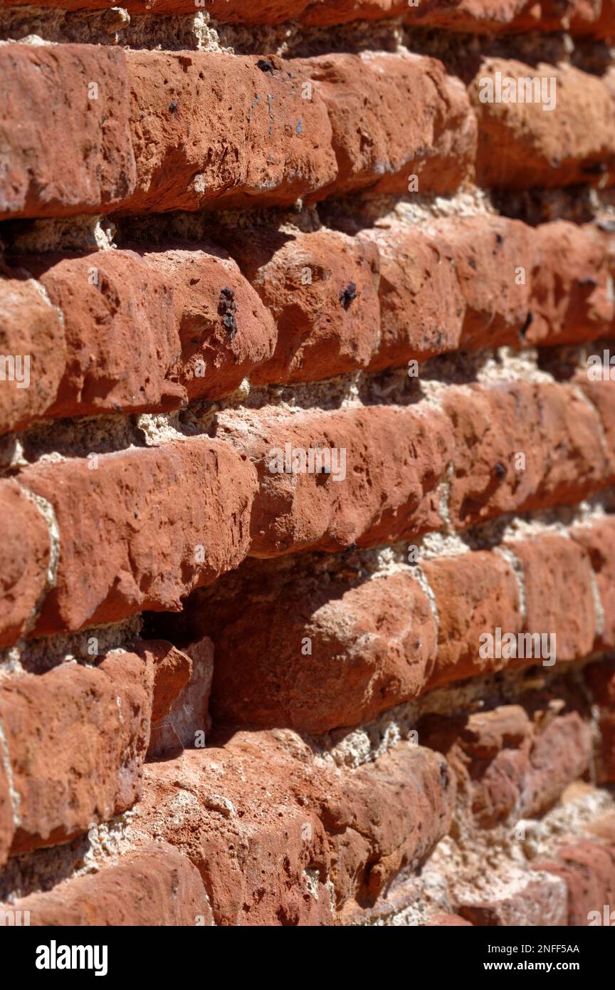 Old, English bond laid brick wall in poor, eroded condition Stock Photo ...