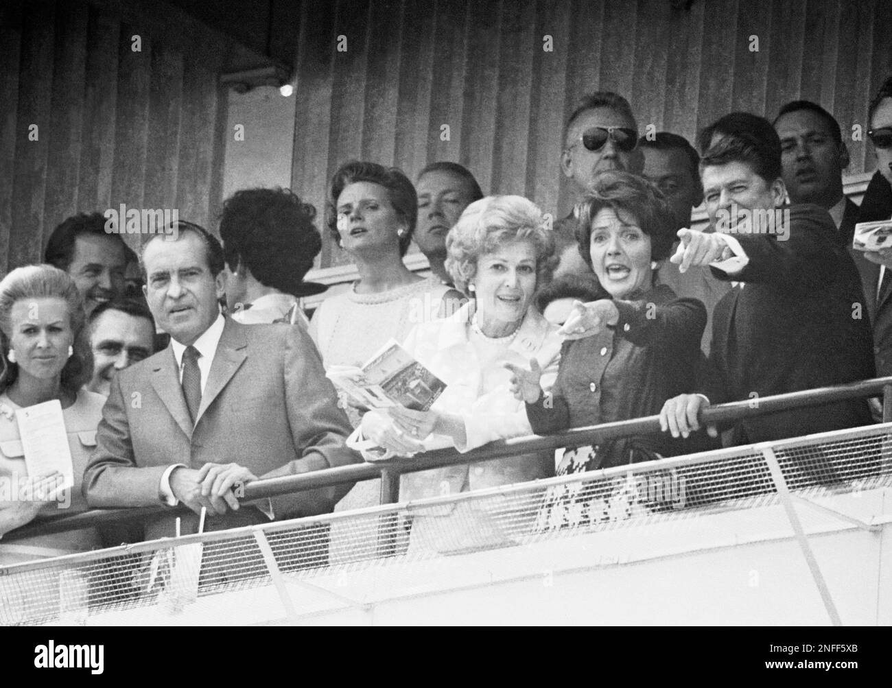 Like typical race fans, Gov. Ronald Reagan and his wife Nancy excitedly ...