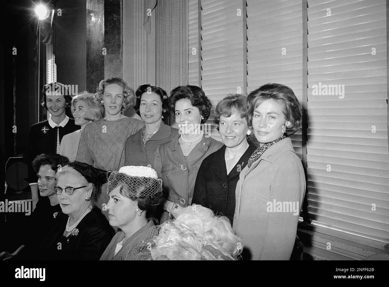 Wives of NASA astronauts, and other women close to the spacemen, pose at the Waldorf-Astoria ...