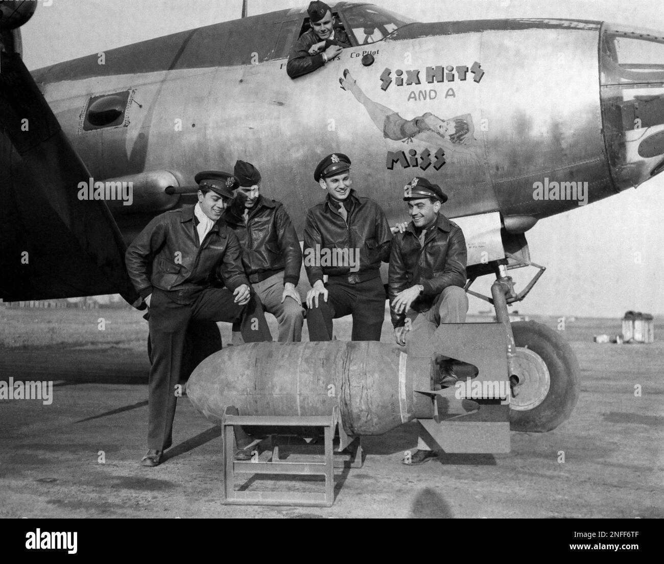 These Illinois airmen are shown at a B-26 Marauder bomber base in ...