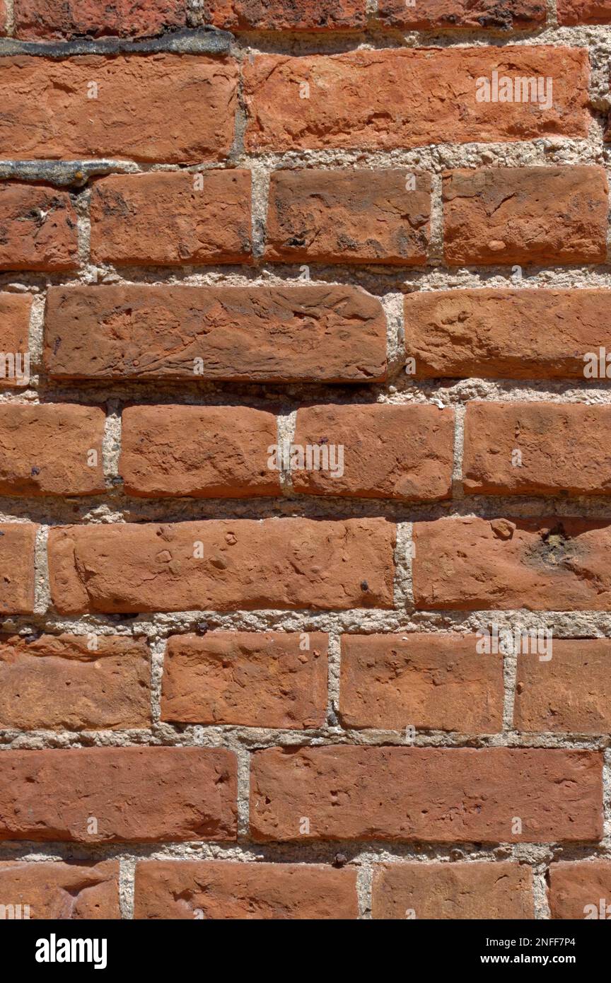 Old, English bond laid brick wall in poor, eroded condition Stock Photo ...
