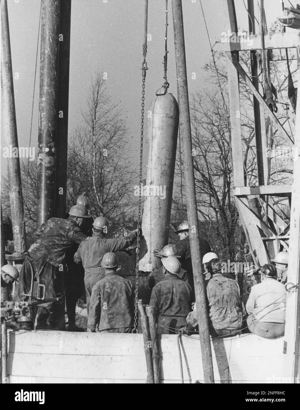 A rescue capsule is lowered by a rescue team at the Lengede iron ore ...