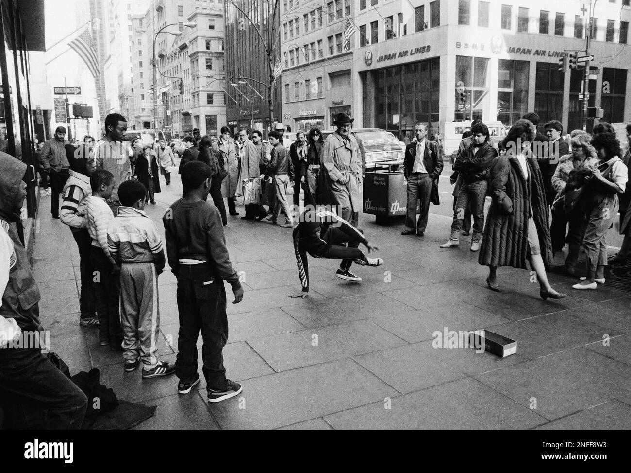 Break dancing kids perform along Fifth Avenue across and 52nd Street ...