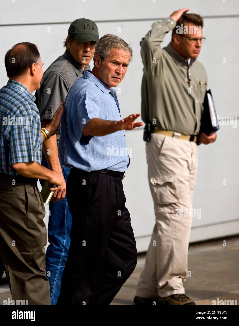 President Bush exits the U.S. Coast Guard Hangar at Ellington Field ...