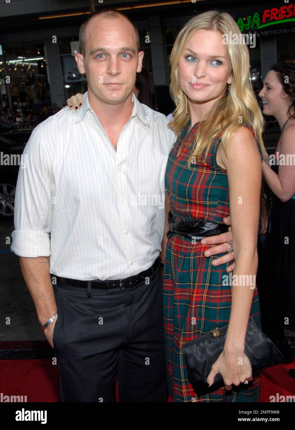 Actor Ethan Embry, left, and his wife, actress Sunny Mabrey pose on the ...