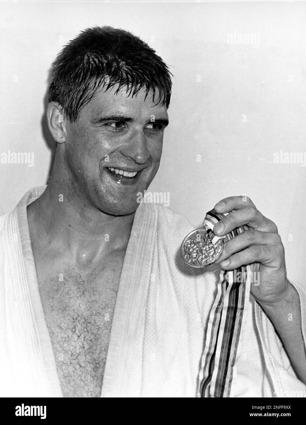 World Judo Champion Anton Geesing of the Netherlands, holds his gold ...