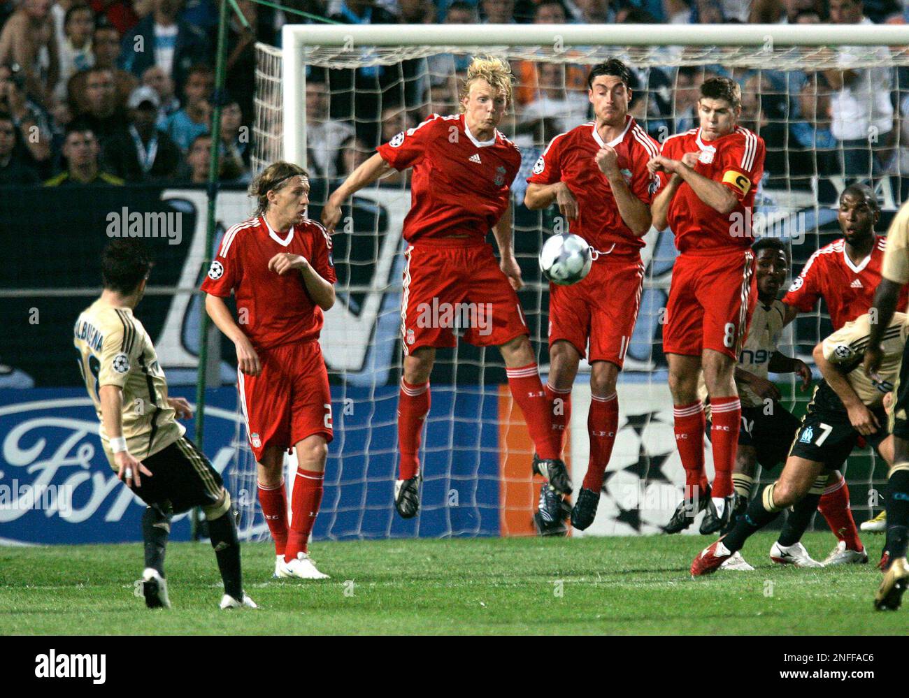 Marseille's Mathieu Valbuena takes a free kick against Liverpool's ...