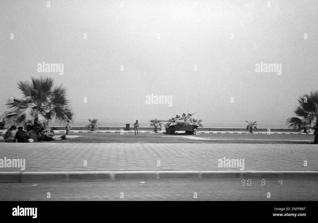 Iraqi tanks and soldiers are shown in Kuwait City, August 4, 1990. (AP ...