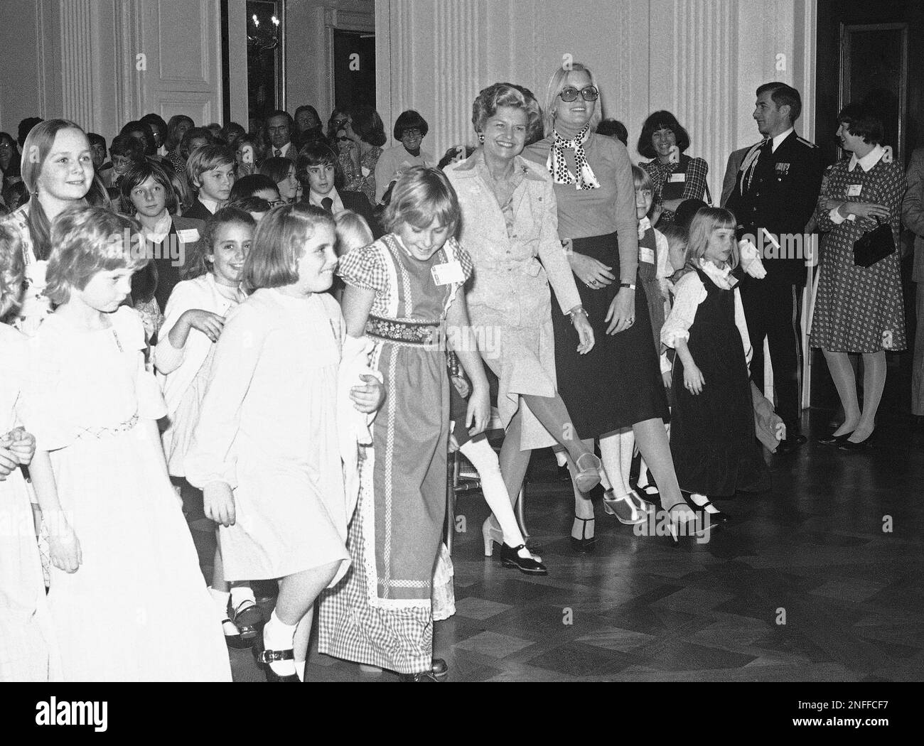 First Lady Betty Ford, center right, and daughter Susan Ford, behind ...
