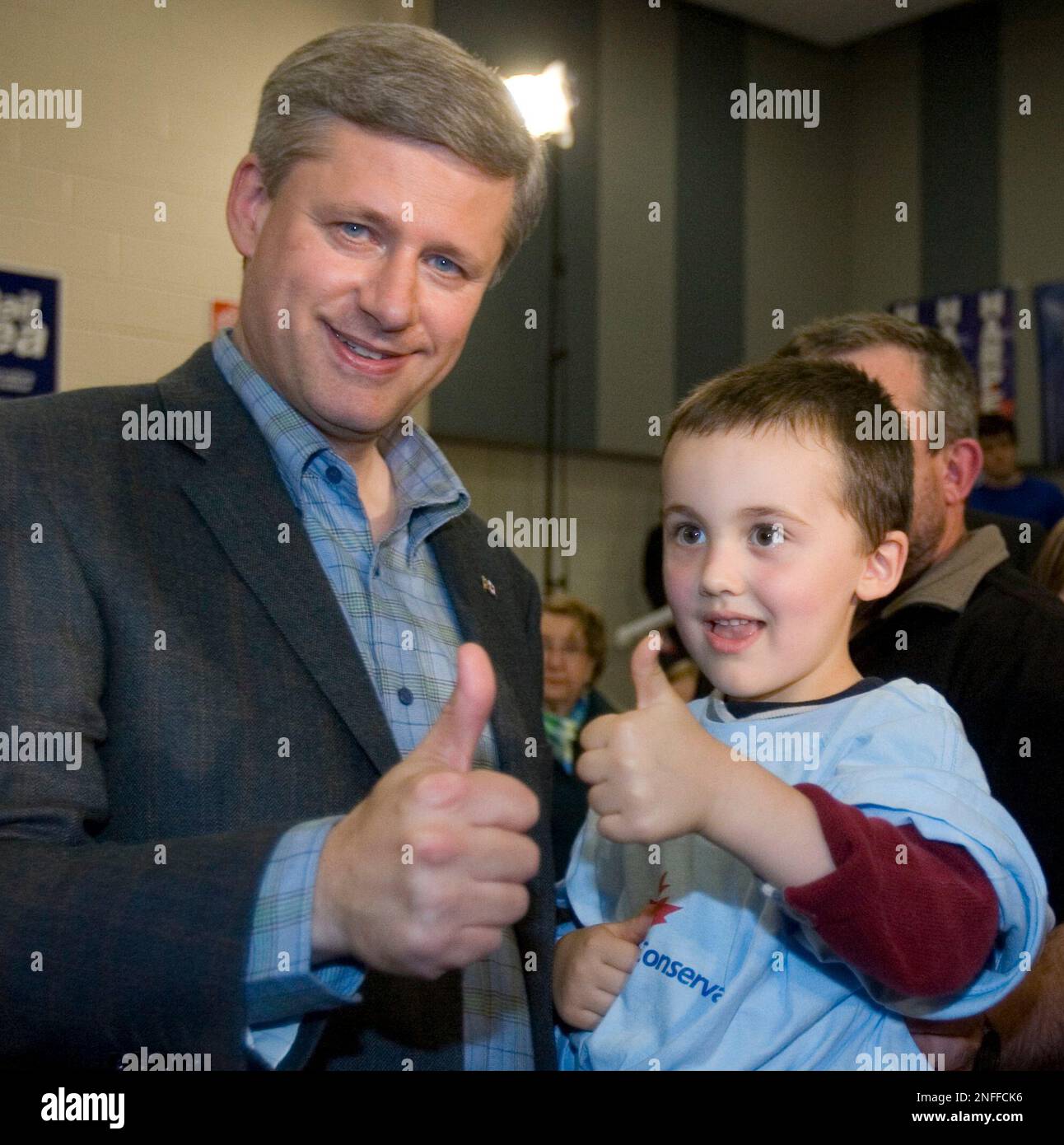 Conservative Party leader Stephen Harper shows five-year-old Chris ...