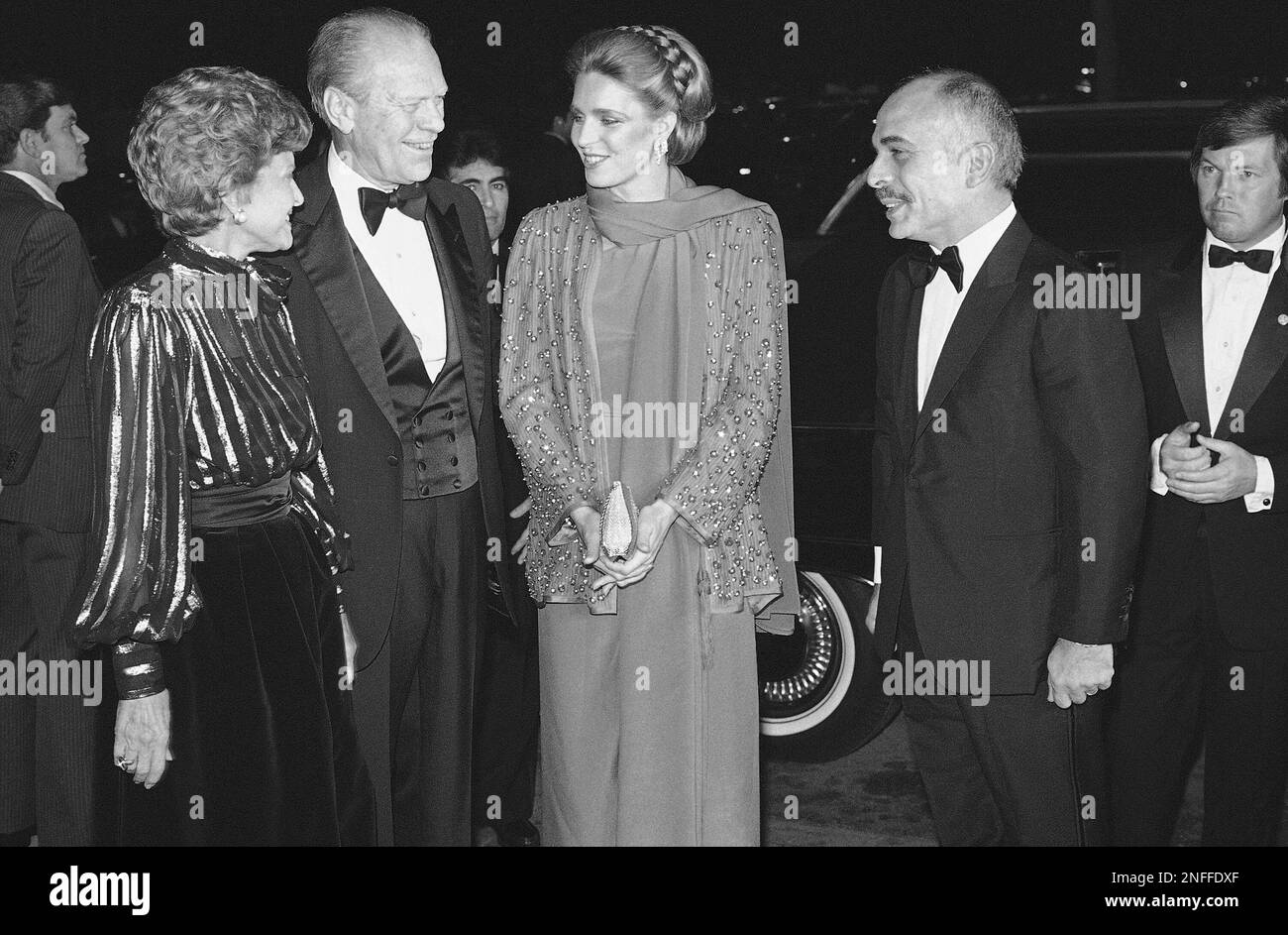 Former President Gerald Ford and his wife Betty, left, greet dinner ...