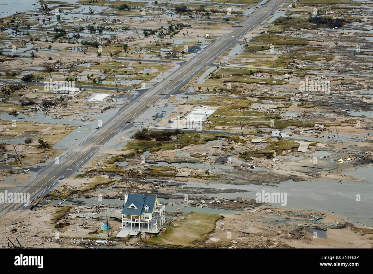 A beachfront home stands among the debris in Gilchrist, Texas on the ...