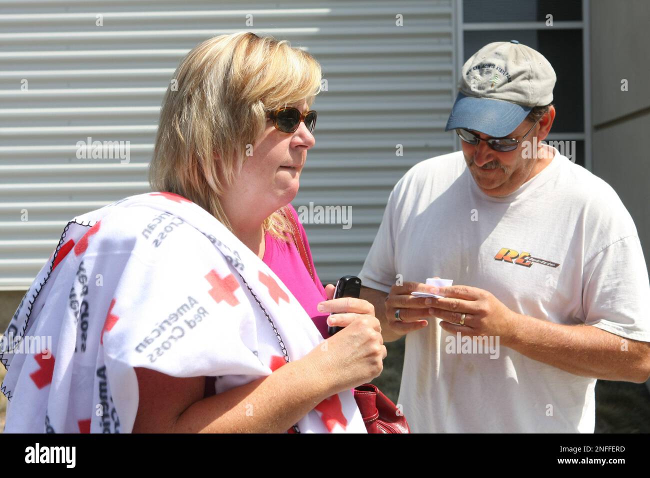 Nancy and Mark Benz talk to a reporter outside Providence Holy Cross ...