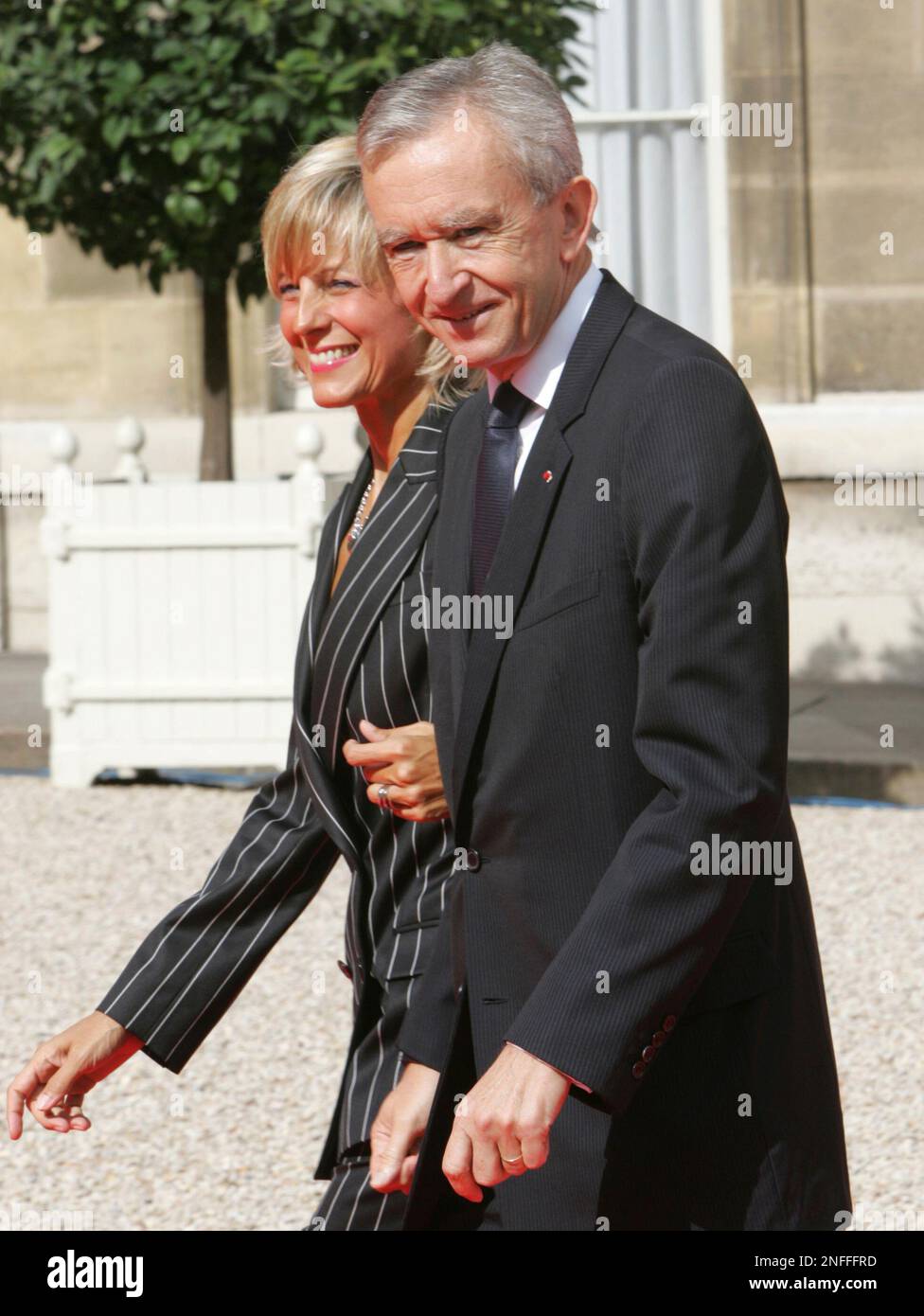 CEO of luxury group LVHM Bernard Arnault and his wife Helene Mercier ...