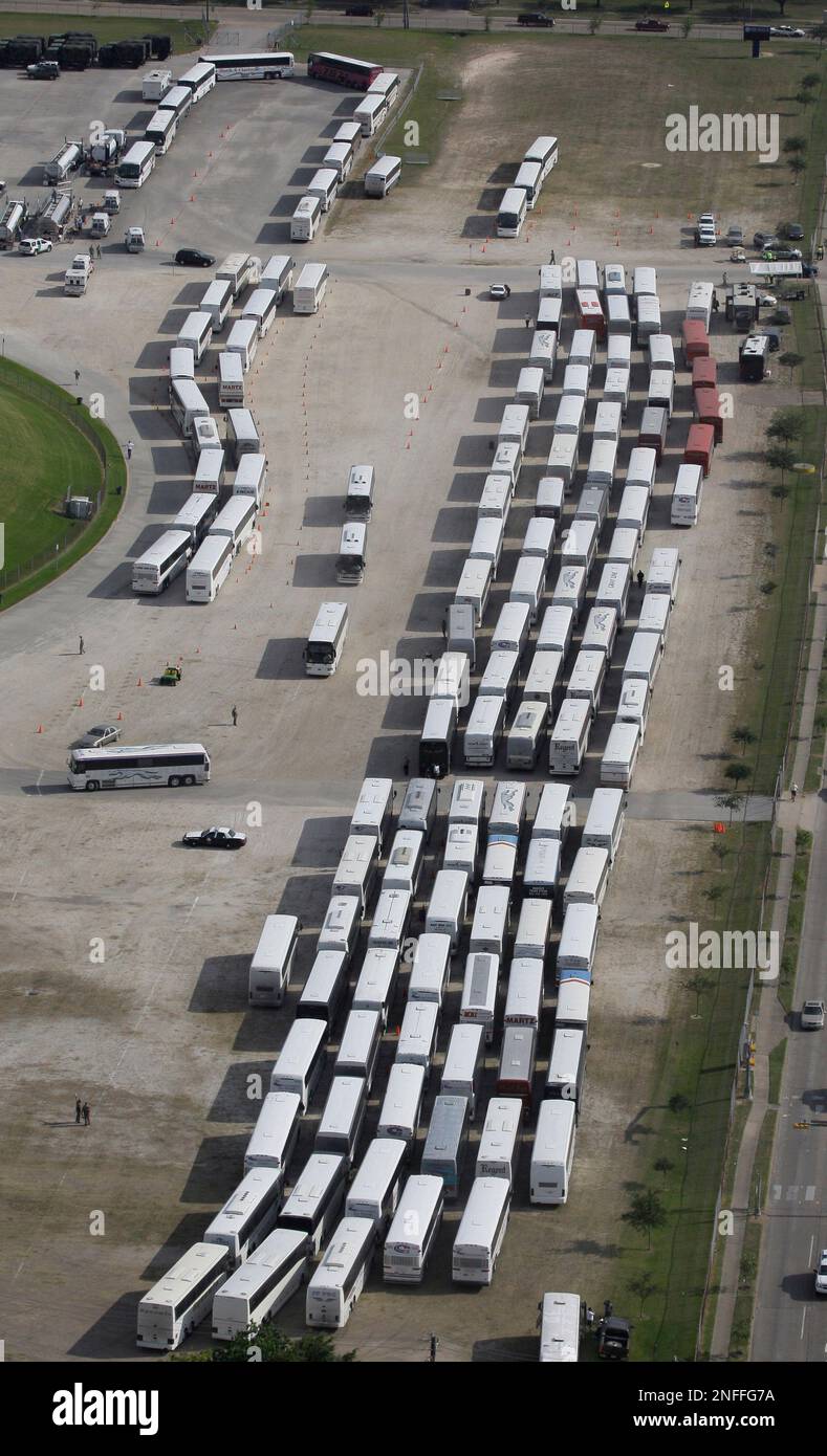 Buses are lined up at an evacuation staging area as Hurricane Ike ...