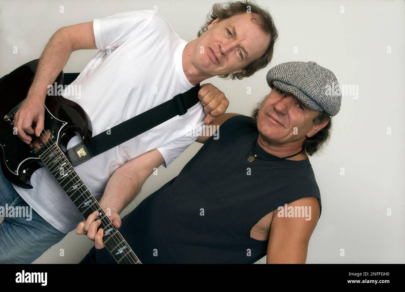 Angus Young, left, and Brian Johnson of AC/DC are photographed in New ...