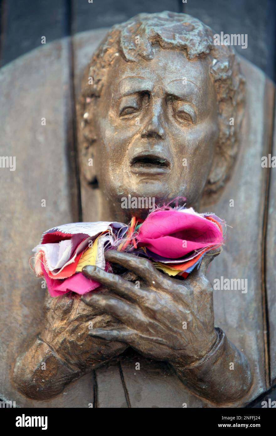 A sculpture of singer Edith Piaf is seen on the Edith Piaf place in ...