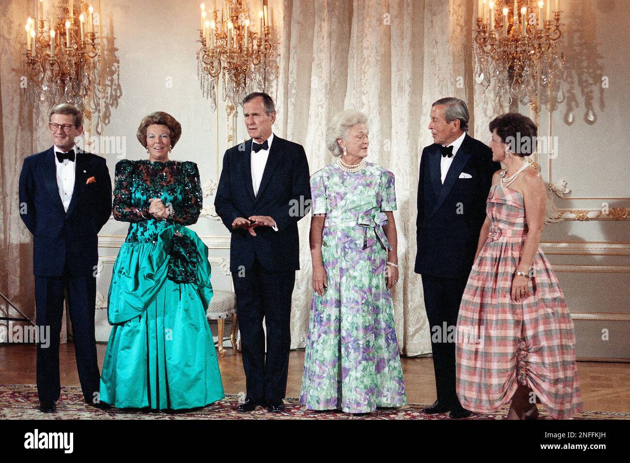 President and Mrs. Bush pose for a photograph with Holland's Queen ...