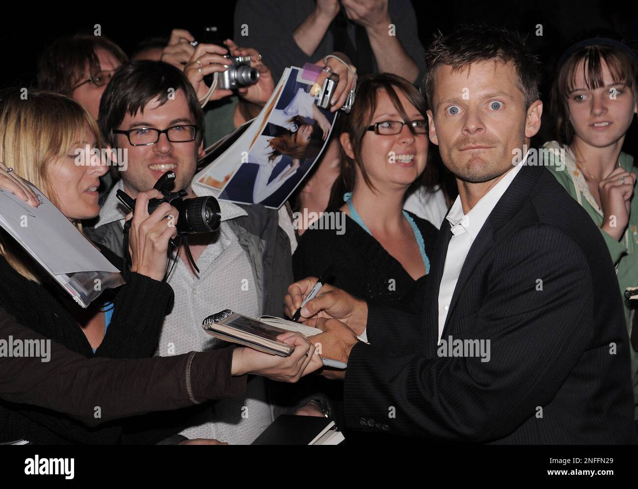 Actor Steve Zahn signs autographs at the premiere of "Management ...