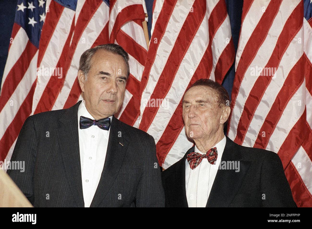 Sen. Strom Thurmond, R-S.C., right, listens to Sen. Robert Dole, R-Kan ...