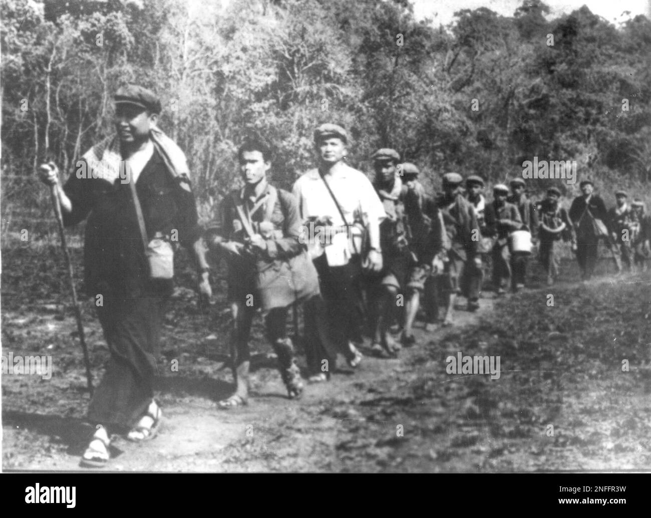 Pol Pot, Prime Minister of Democratic Kampuchea, leads Cambodian ...