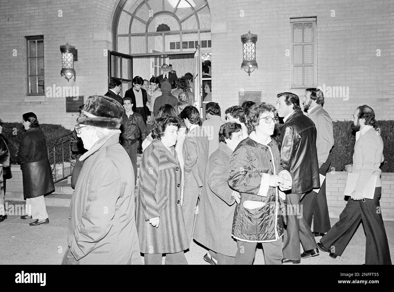 Crowds arrive and depart from the funeral home in south Philadelphia ...