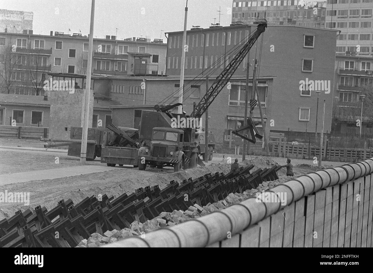 A crane drops tank traps in East Berlin, East Germany, April 18, 1967 ...