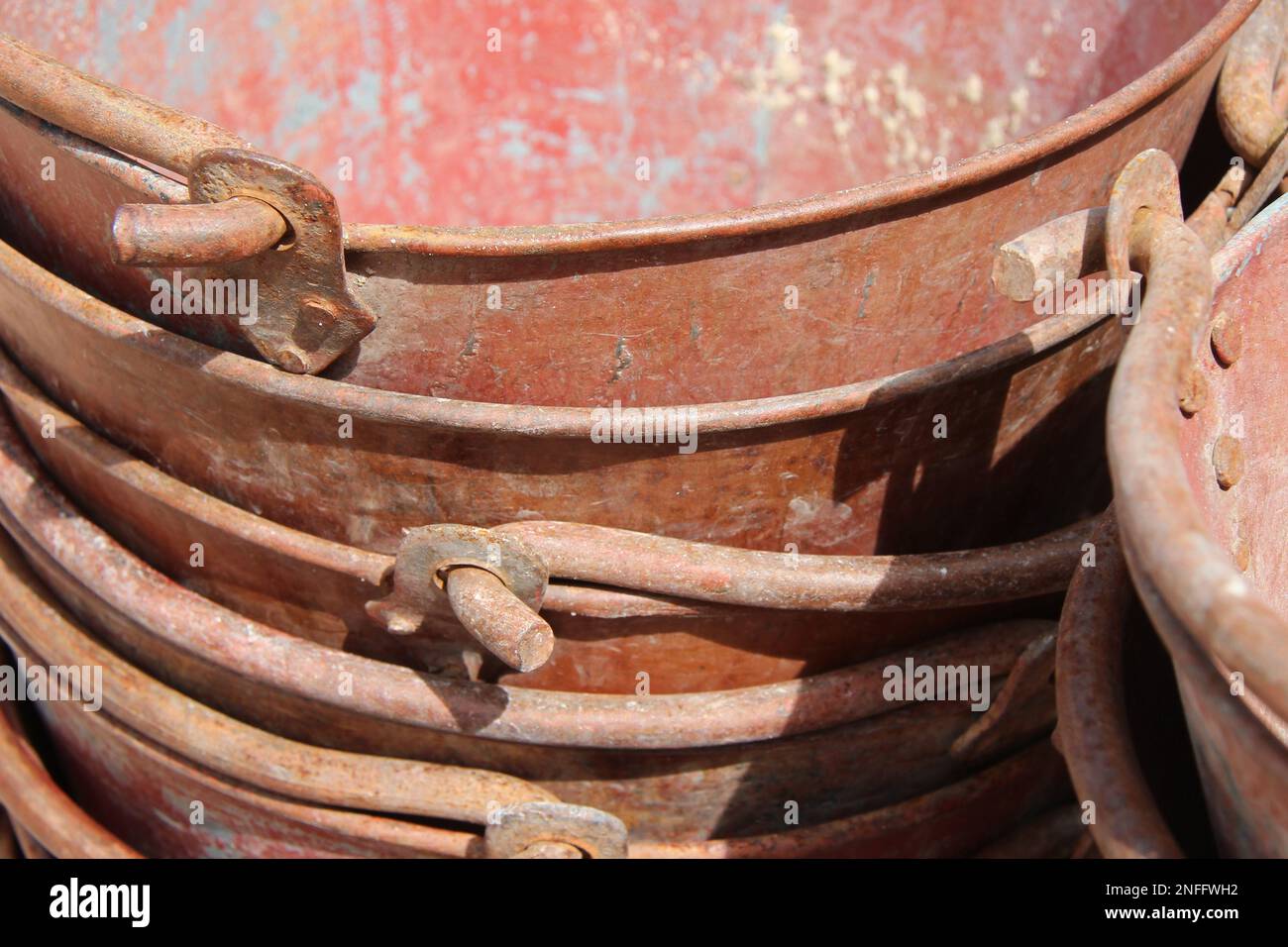 rusty bucket in a garden (france Stock Photo - Alamy