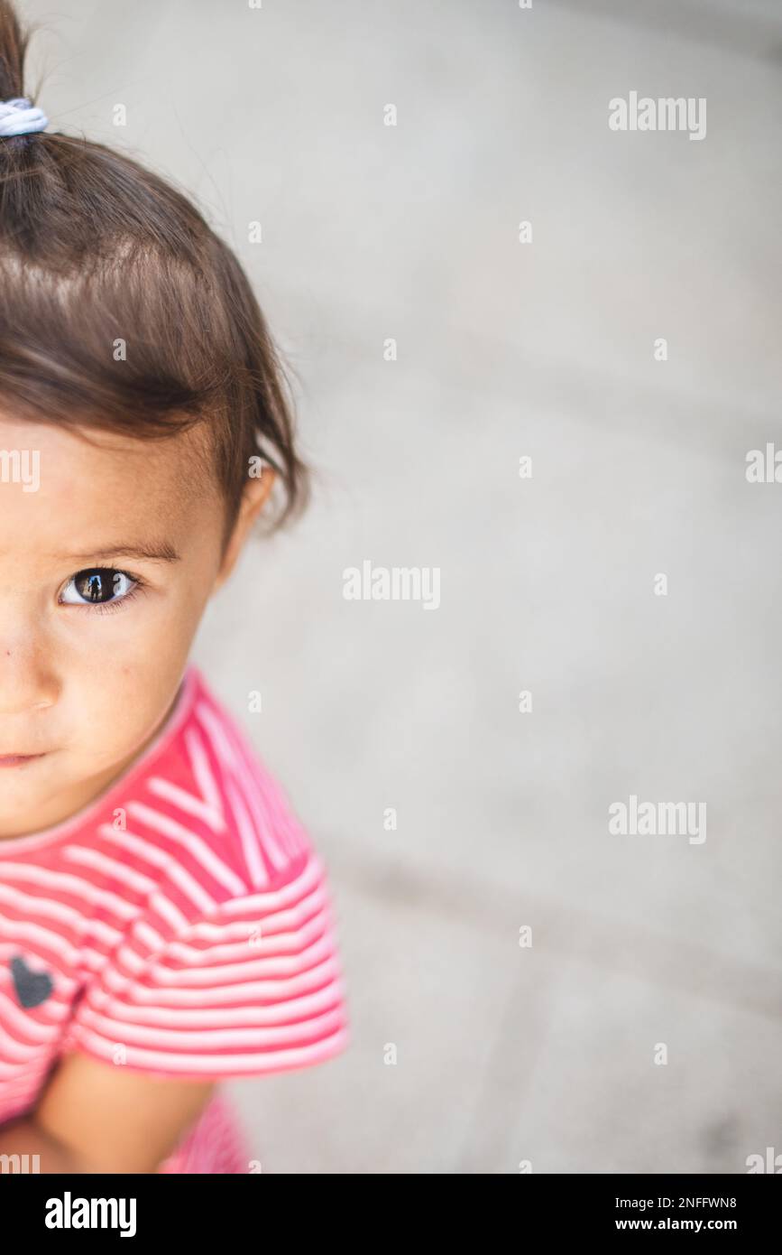 Top view portrait of a beautiful little girl. Half face portrait Stock ...