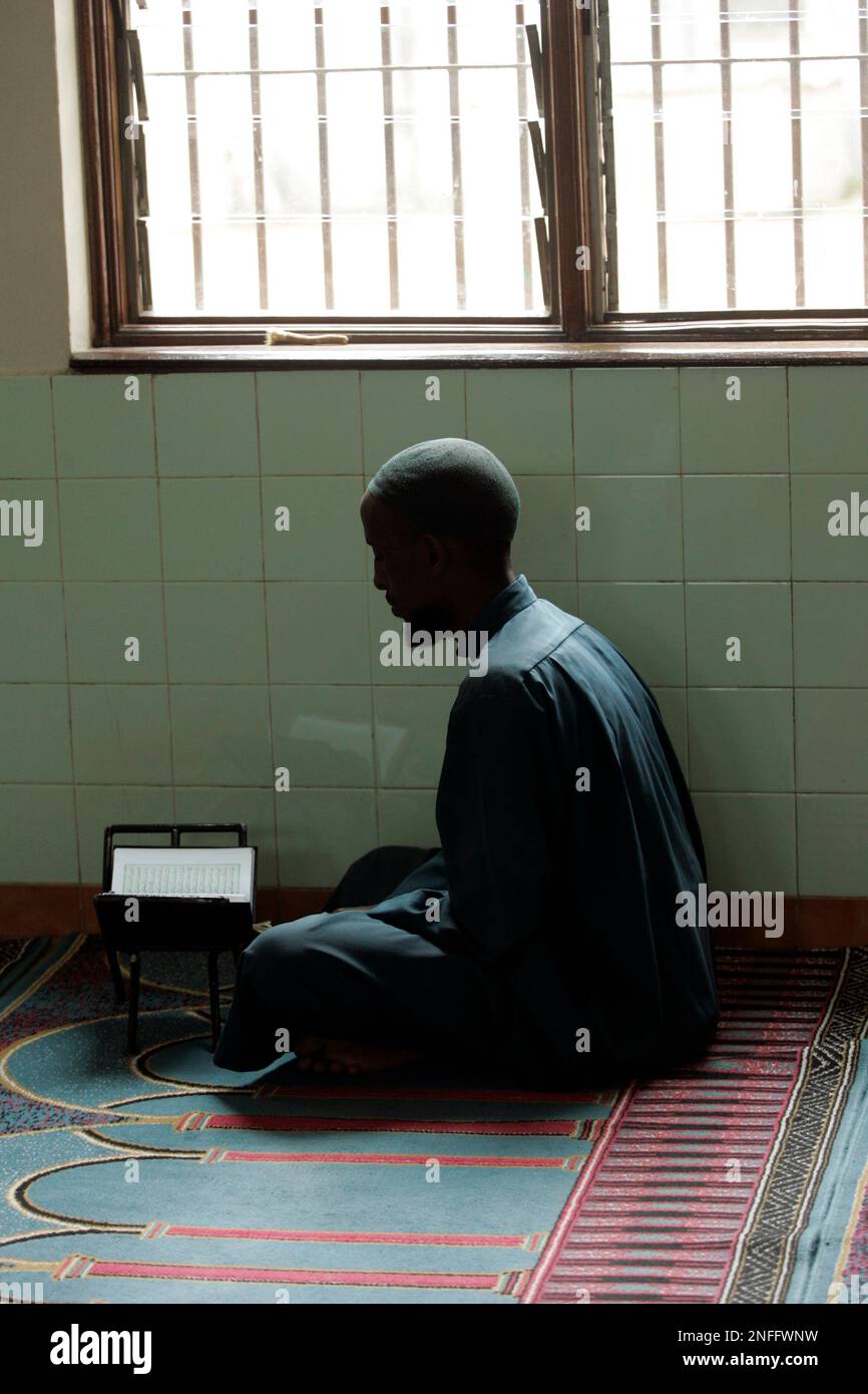 A Kenyan Muslim reads Quran in Noor Mosque in Nairobi, Kenya, Wednesday ...